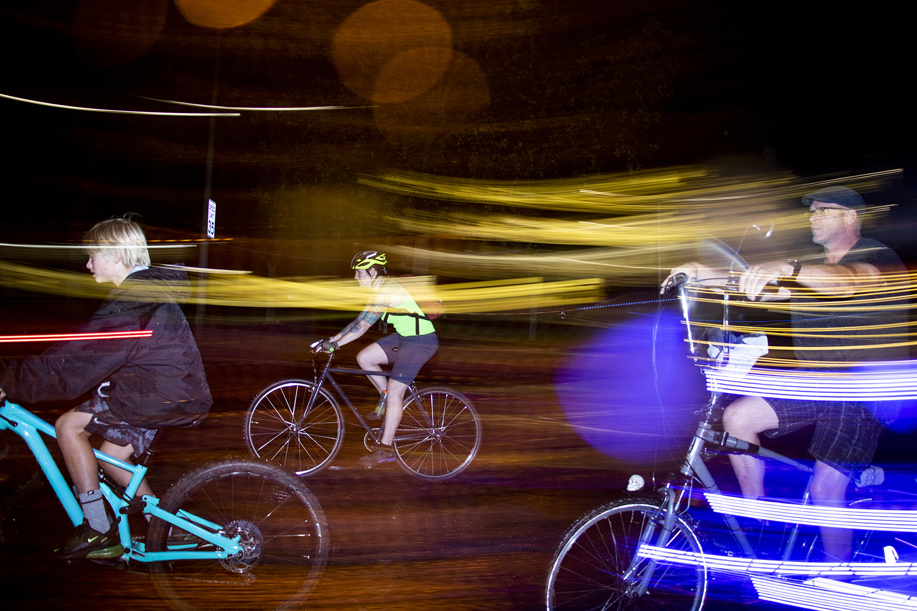 Photos of Denver Cruisers riding, taken from a bike seat. – NPPA Contests
